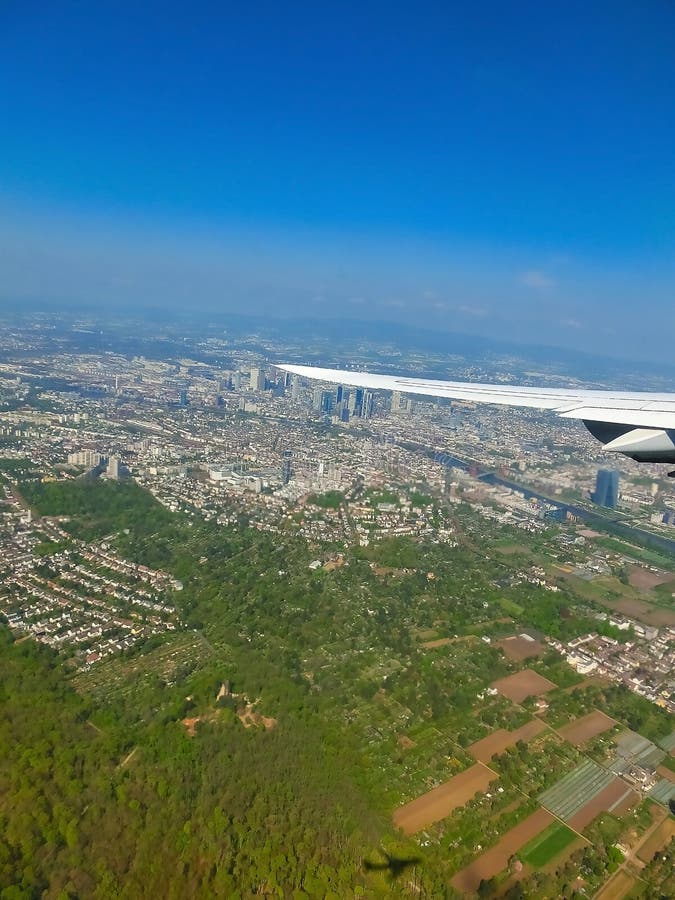 Airplane Window View of Wing, Highway Junctions and Green Forest. Stock ...