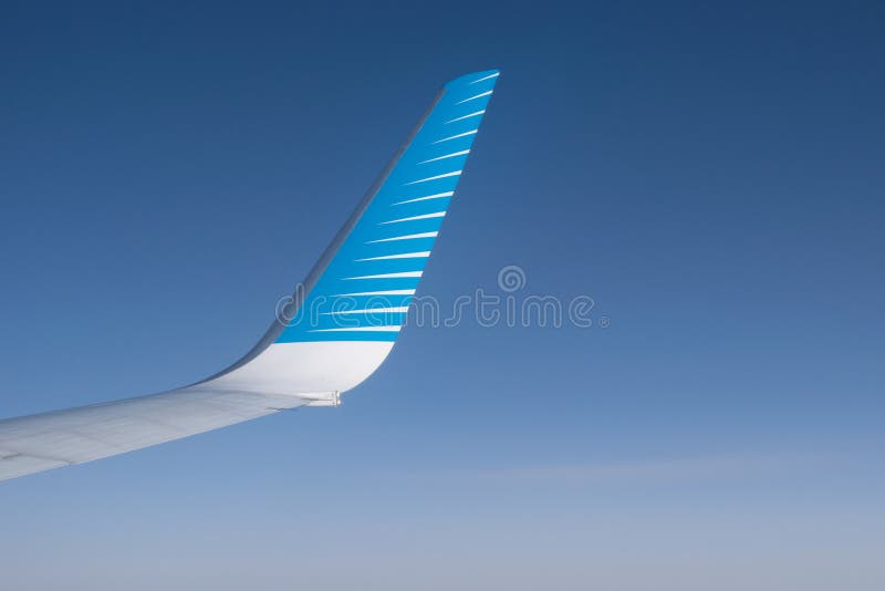 Airplane Wing on a Blue Sky Stock Photo - Image of tourism, airline ...