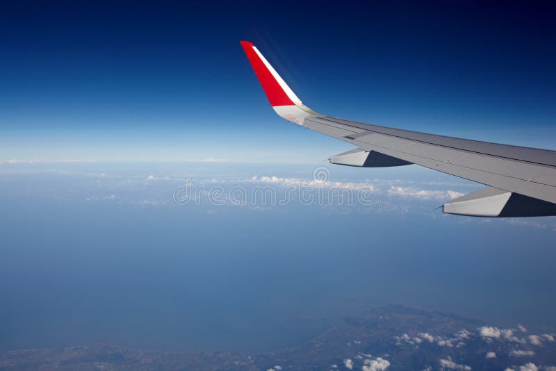 Airplane wing and blue sky stock photo. Image of plane - 40389418