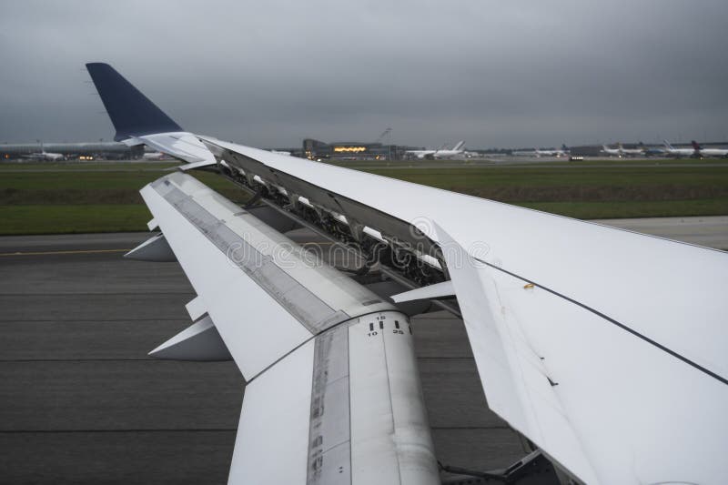 Airplane Wing with Deployed Flaps during Landing Stock Image - Image of ...