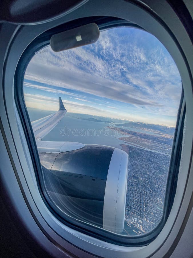 Airplane Wing and Engine Framed through Window View Stock Photo - Image ...