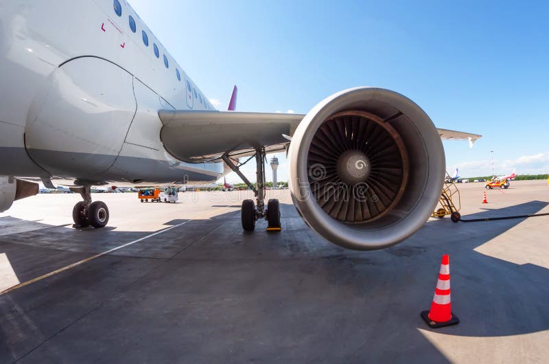 Airplane Wing with Engine, View Under the Plane during Flight Service ...