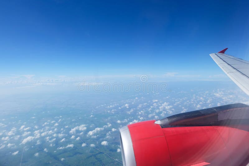 Airplane Wing in Flight Above Sky Stock Photo - Image of clear, machine ...