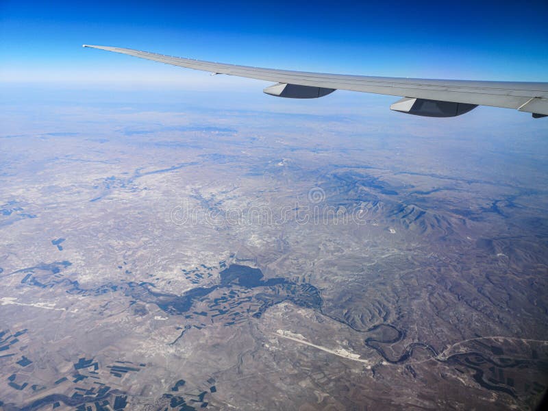 Airplane wing in flight stock photo. Image of aircraft - 171467566