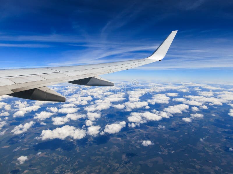 Airplane wing stock image. Image of tourism, cloudscape - 36429601