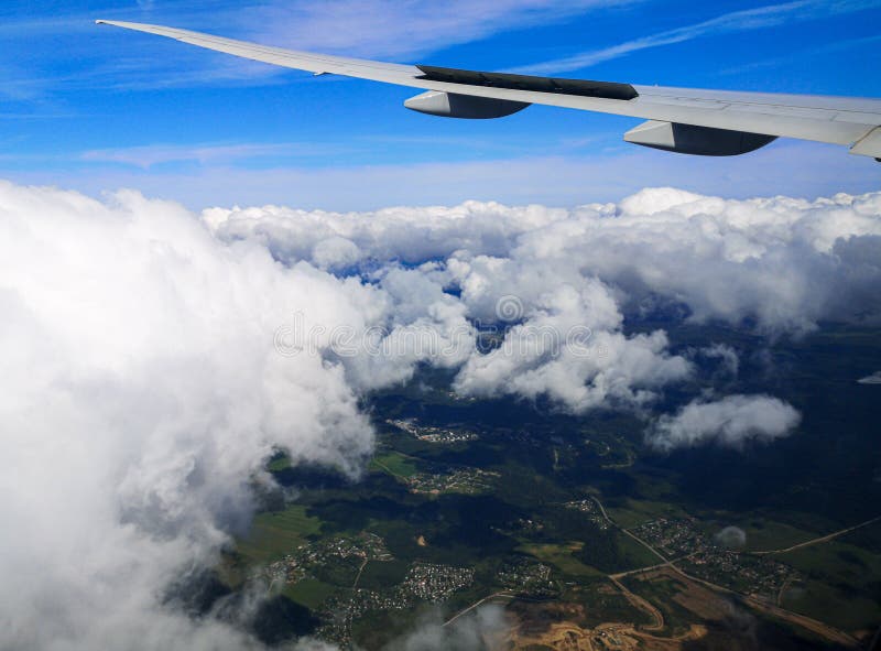 Airplane wing in flight stock image. Image of airplane - 194871407