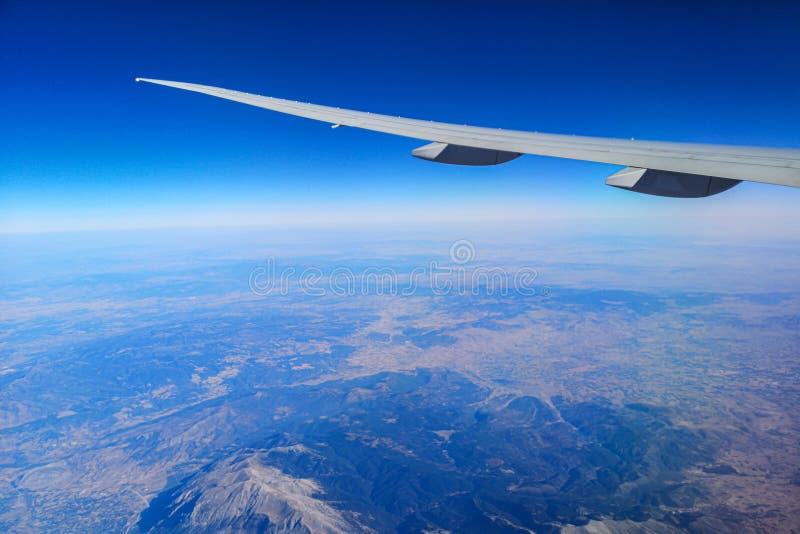 Airplane wing in flight stock image. Image of aircraft - 218124633