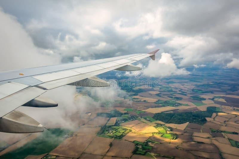 Airplane Wing Flying Above the Fields Stock Image - Image of boeing ...