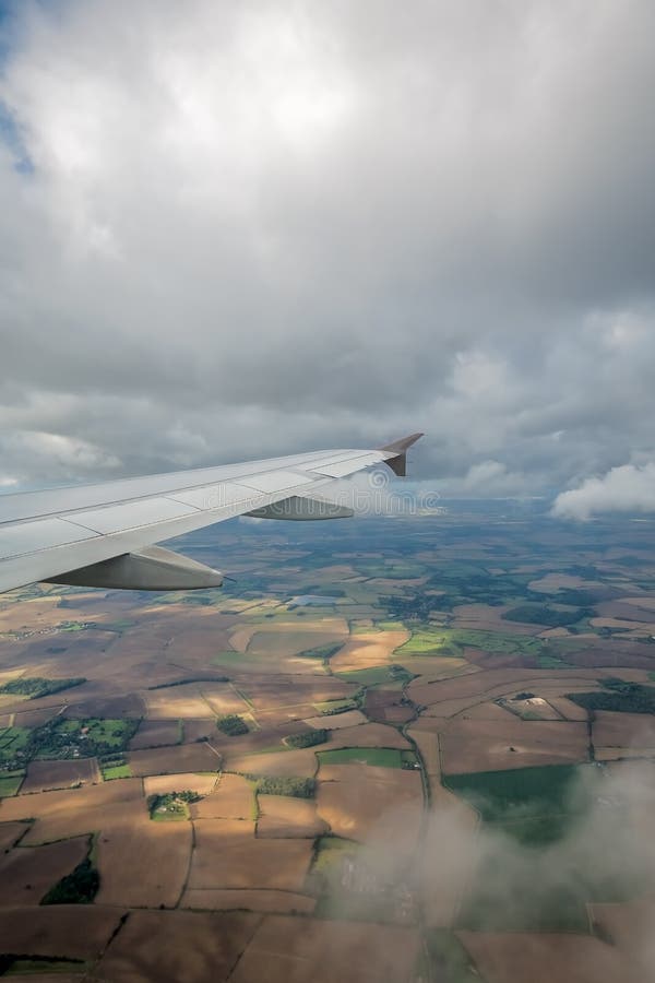 Airplane Wing Flying Above the Fields Stock Photo - Image of ...