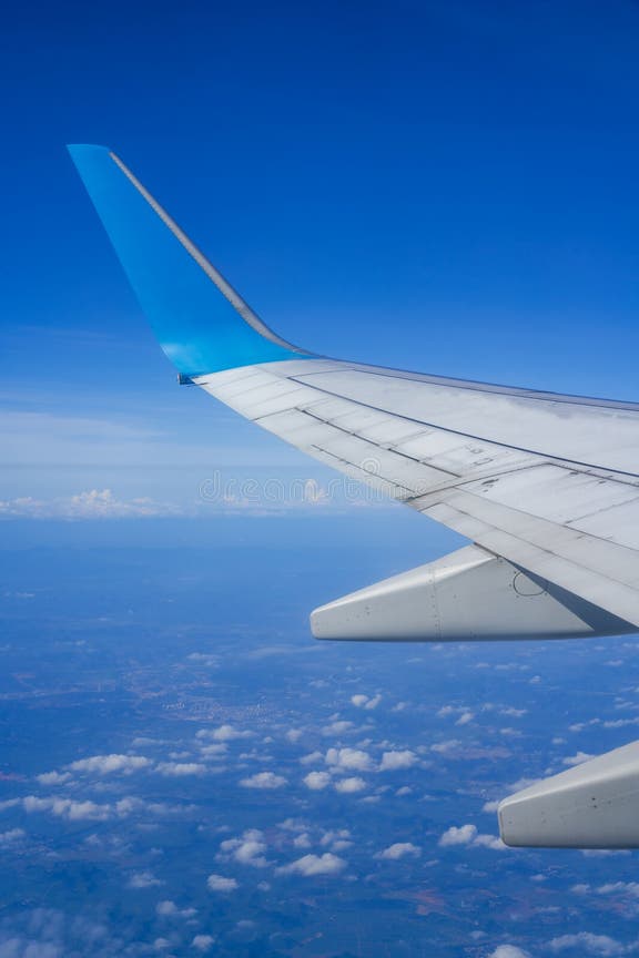 Airplane Wing Flying in the Blue Sky Stock Image - Image of plane ...