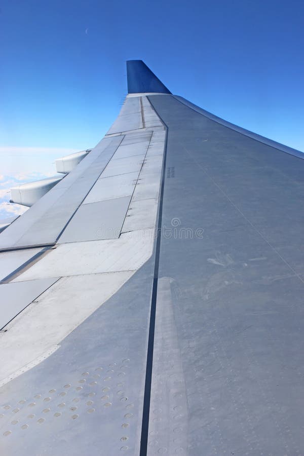 Airplane wing flying stock photo. Image of transport - 132272312