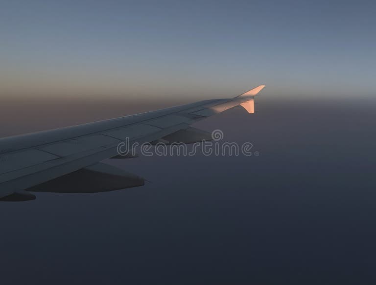 Airplane Wing with Golden and Blue Hour Light Stock Photo - Image of ...