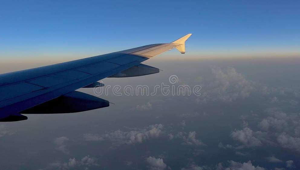 Airplane Wing with Golden and Blue Hour Light Stock Photo - Image of ...