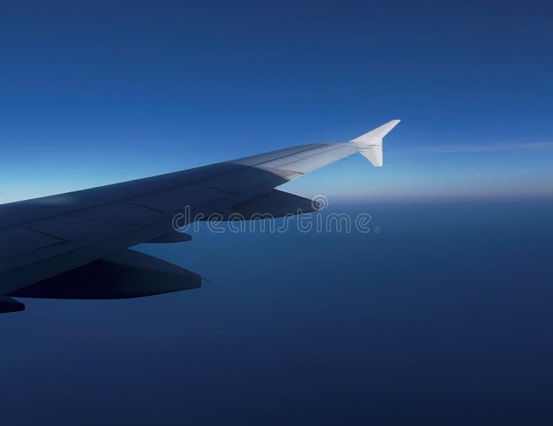 Airplane Wing with Golden and Blue Hour Light Stock Photo - Image of ...