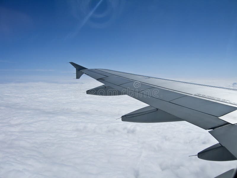 Airplane Wing Over the Clouds, Stock Photo - Image of wing, aerial ...