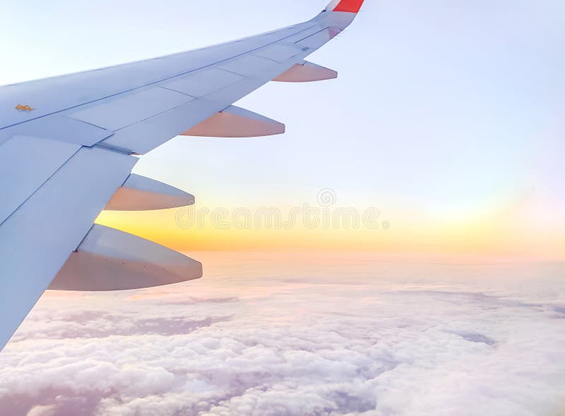 Airplane Wing in the Sky at Beautiful Sunset, Airplane Flight in the ...