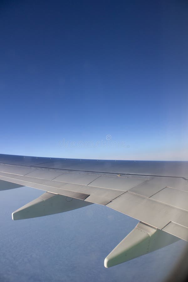 Airplane Wing in the Sky. View from a Great Height. Stock Image - Image ...