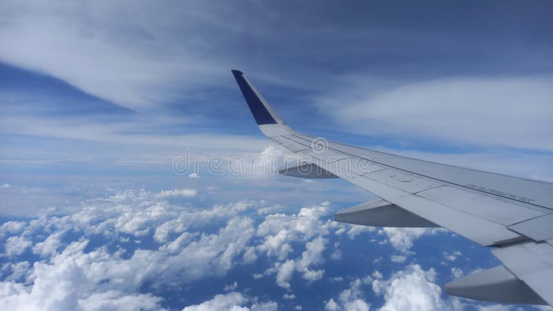 Airplane Wing among Various Kinds of Clouds on a Daytime Flight Stock ...
