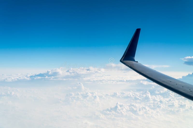 Airplane Wing View Above Clouds Stock Photo - Image of clean, airplane ...