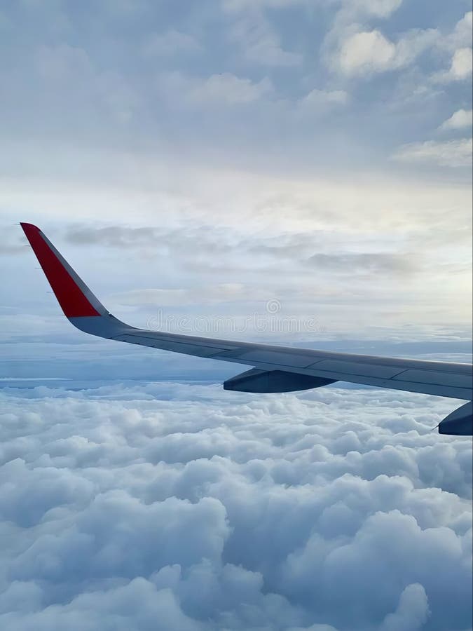 Airplane Wing View Above the Clouds Stock Photo - Image of freedom ...