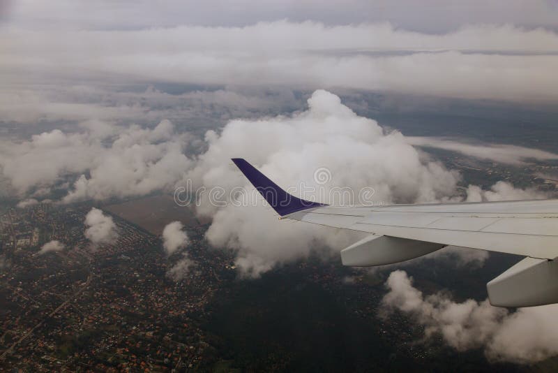 Airplane Wing View from the Plane To the Sky, Clouds, Earth from Height ...