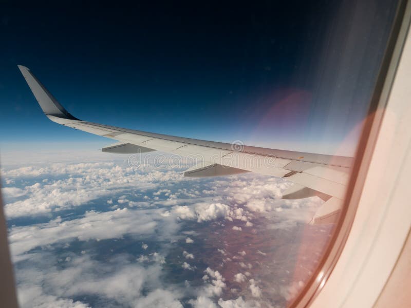Airplane Wing. View from the Airplanes Porthole Stock Image - Image of ...