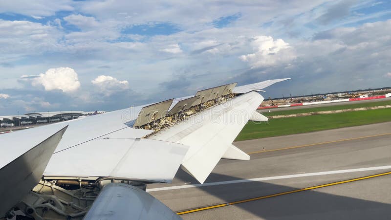 Airplane Wing, View from the Window while the Plane is Landing at the ...