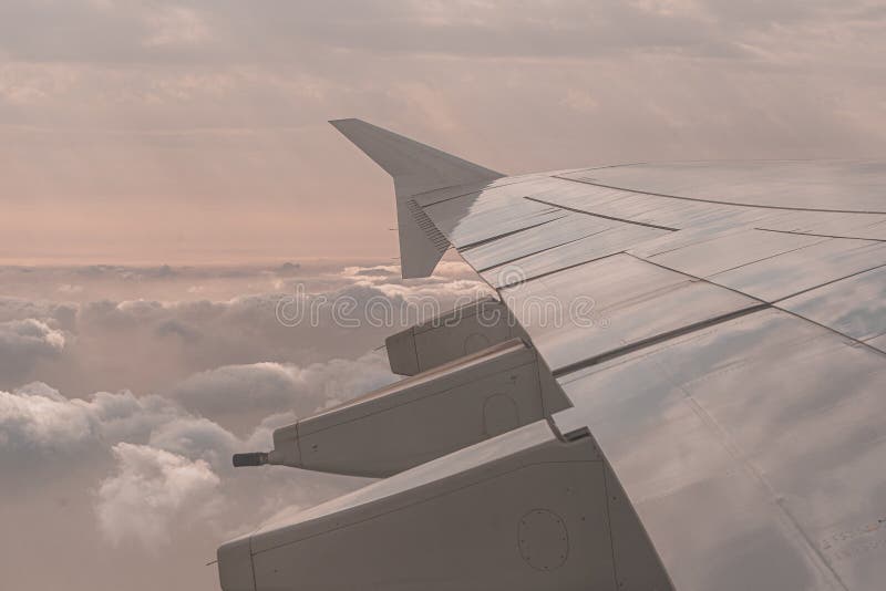 Airplane Wing through the Airplane Window Stock Photo - Image of ...
