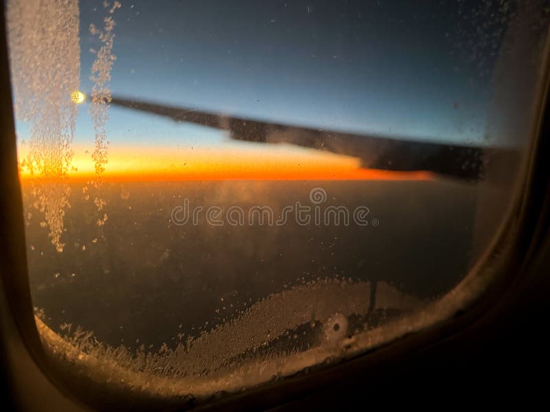 Airplane Wing from the Window at Sunrise in the Morning Stock Image ...