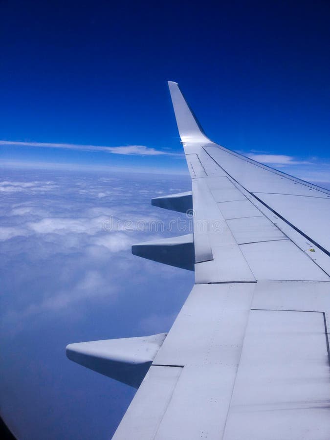 Airplane wing window view stock photo. Image of plane - 265272882