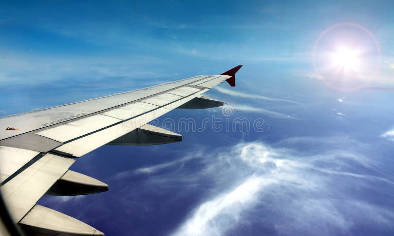Airplane wing windows view stock photo. Image of business - 78661166