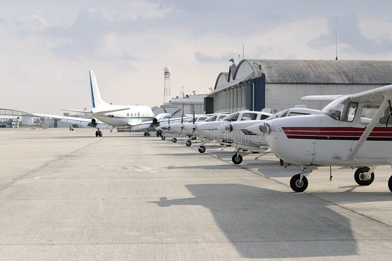 Airplanes in a Row stock photo. Image of weather, white - 7426704