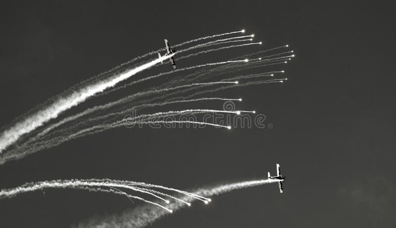 Airplanes throwing Flares stock photo. Image of dark - 104024844