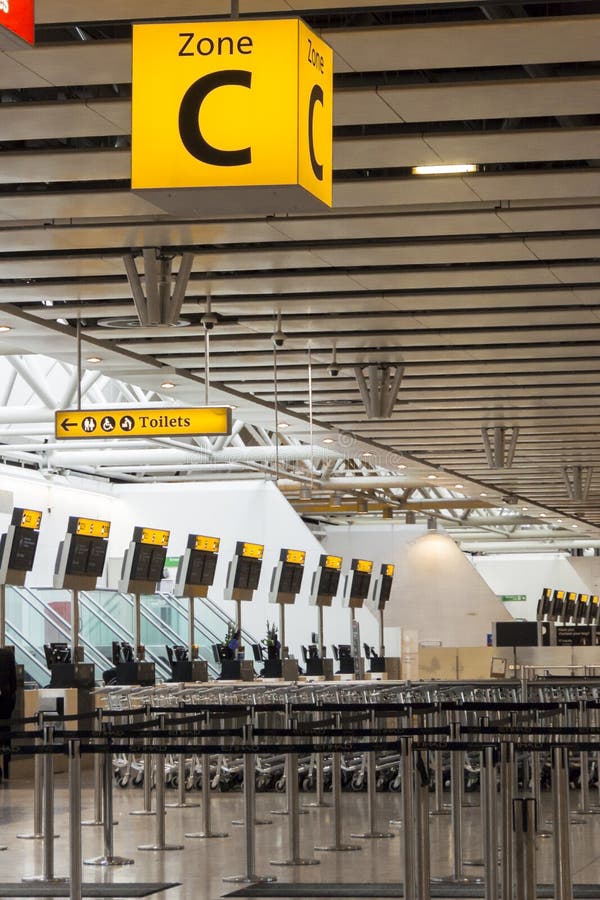 Airport Check In Desks And Zone C Sign Stock Image - Image of airport ...