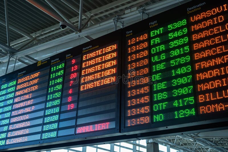 Airport departure board stock photo. Image of canary - 157274316