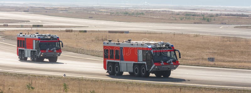 Airport fire trucks stock image. Image of firetruck, airport - 77280629