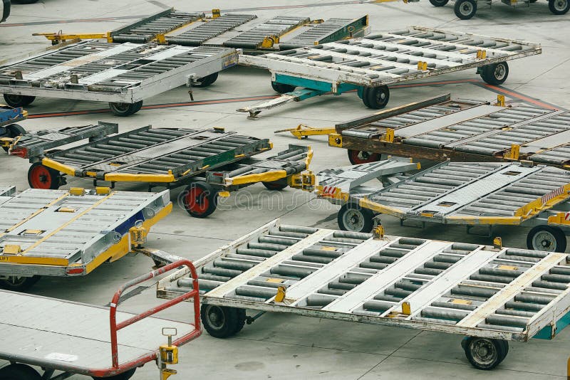 Freight Trolleys Parking Standby in Airport. Service Vehicle Stock ...