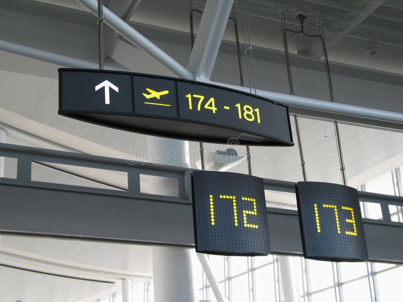 Airport gate signs stock image. Image of arrival, away - 27205501