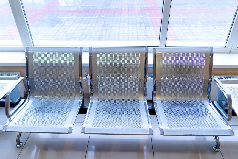 Airport Gate Waiting Area with Metal Seats Stock Photo - Image of ...