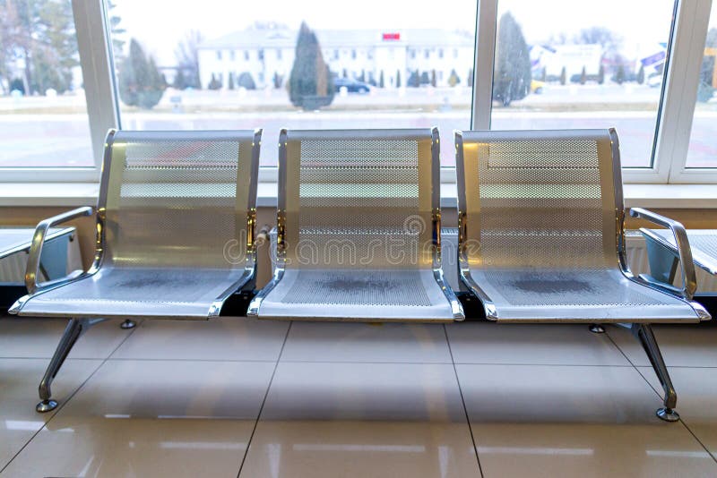Airport Gate Waiting Area with Metal Seats Stock Image - Image of ...