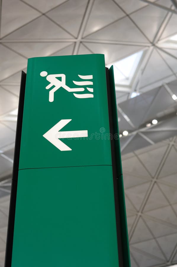 Airport green exit sign stock image. Image of international - 6396051