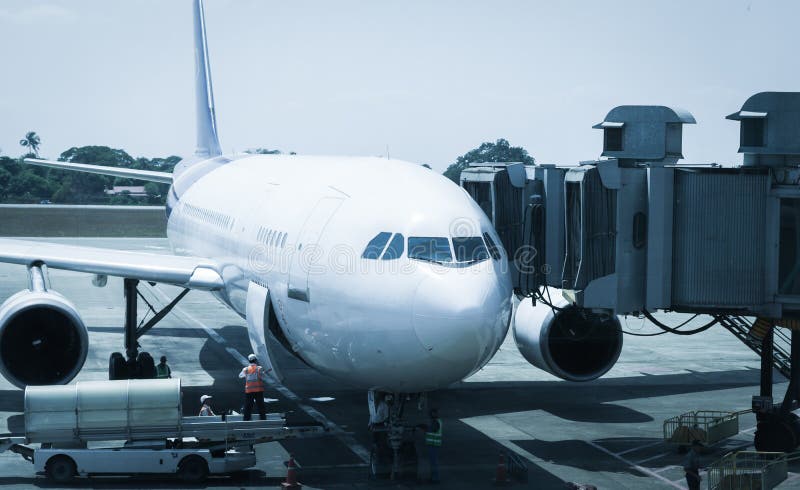 Ground Crew Guides a Jet To the Gate Editorial Photography - Image of ...