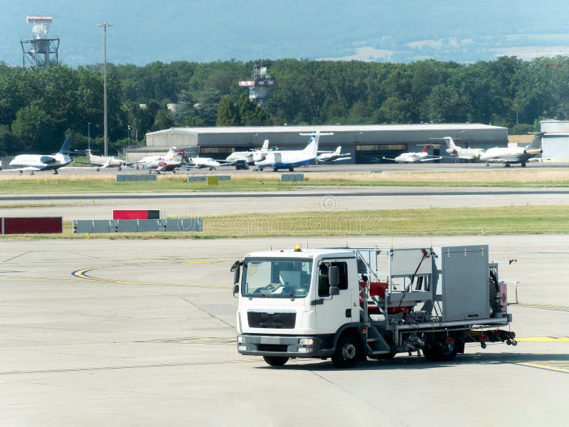 Airport Ground Support Vehicle on Runway Stock Image - Image of ...