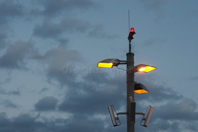 Airport Lamp at dawn stock photo. Image of clouds, airport - 2029806