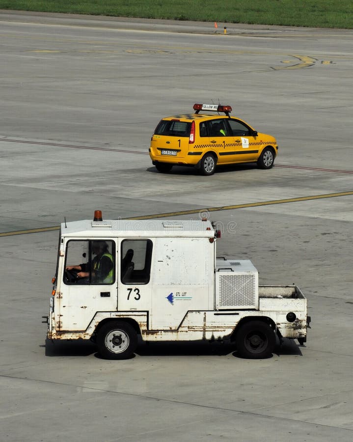 Airport service cars editorial stock photo. Image of industry - 23223893