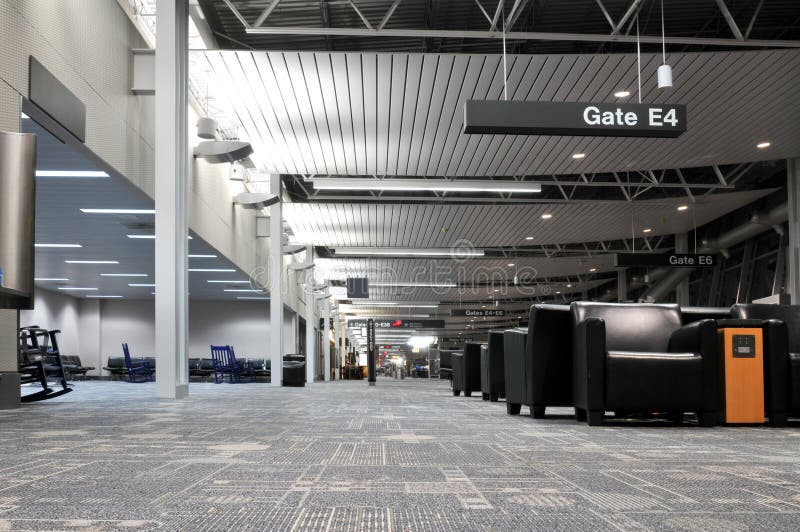 Airport terminal interior stock image. Image of arrows - 12876695