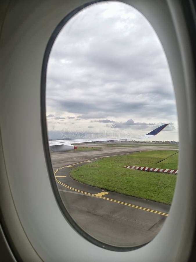 An Airport View from the Window Seat of a Plane Stock Photo - Image of ...