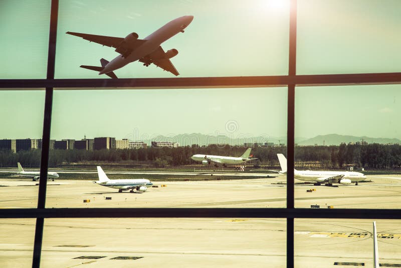 Airport Windows and Airplane at Sunset Stock Image - Image of plane ...