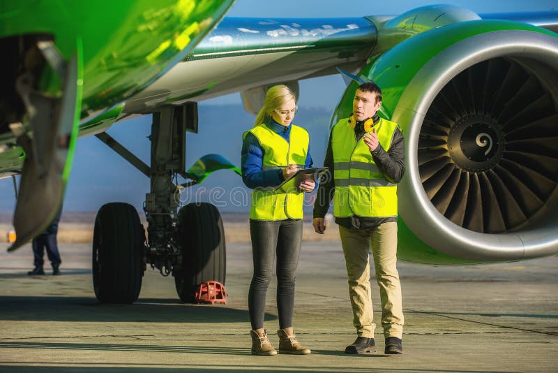Airport Workers Handling Airplane Stock Photo - Image of person ...