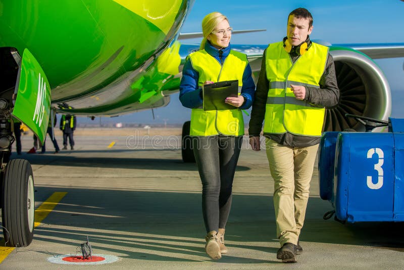 Airport Workers Handling Airplane Stock Image - Image of plane ...